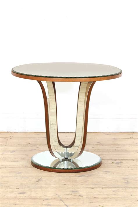 Lot 187 An Art Deco Mirrored Glass Occasional Table