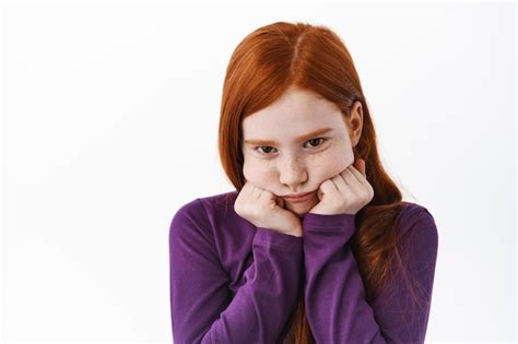 Premium Photo Portrait Of Cute Redhead Girl Pouting Making Coy