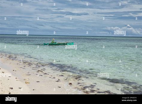 The Beach Of Tiny Mantigue Island Near Camiguin In The Philippines On