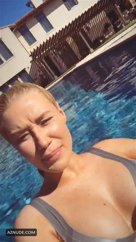 Iggy Azalea Sexy Cleavage In A Hot Day In A Pool Aznude
