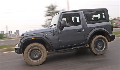 Maruti Suzuki Jimny Vs Mahindra Thar Price Specification Look Interior