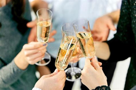 Celebration Hands Holding The Glasses Of Champagne And Wine Making A