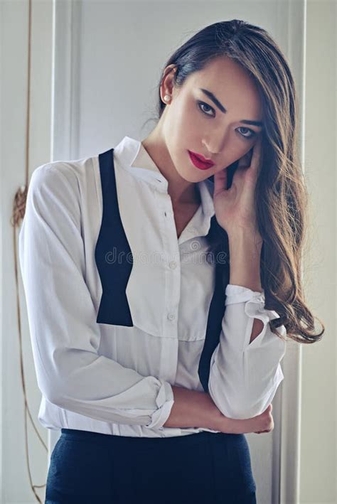 Keeping It Classy Portrait Of An Attractive Young Woman With Long