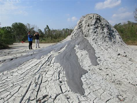 prof höfle right and dr mon shieh yang left standing next to a mud volcano giscience blog