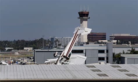 Pilot Escapes With Minor Injuries After Small Plane Crashes Into Hangar