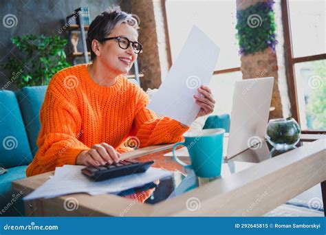 Photo Of Charming Positive Elderly Lady Wear Orange Pullover Counting