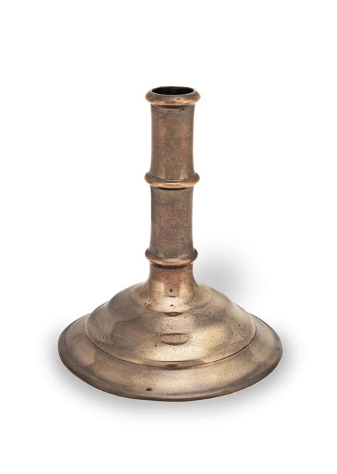 Bonhams An Unusual Copper Alloy Socket Candlestick European