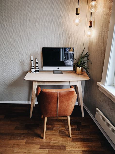 Download Sleek Aesthetic Mac Setup With Warm Lights Wallpaper