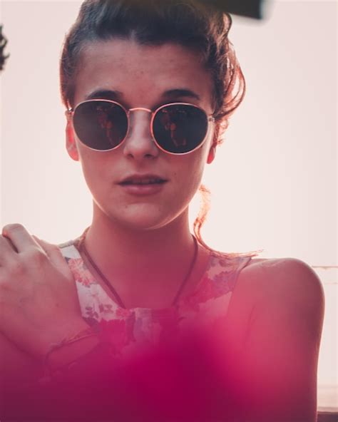 Premium Photo Close Up Of Young Woman Wearing Sunglasses