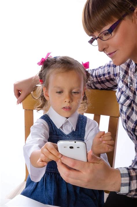 Mother And Daughter With Mobile Phone Stock Image Image Of Counter