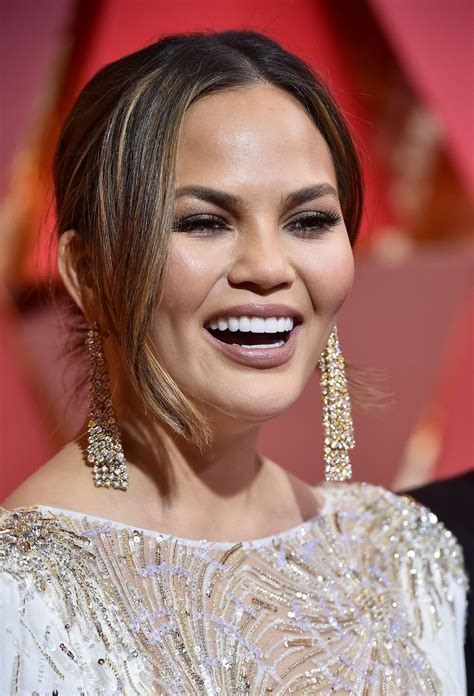 Chrissy Teigen Oscars Red Carpet In Hollywood Celebmafia