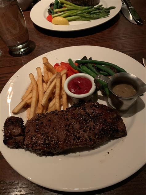 A Beautiful Medium Rare Steak With Fries And Veggies Rdinnerideas