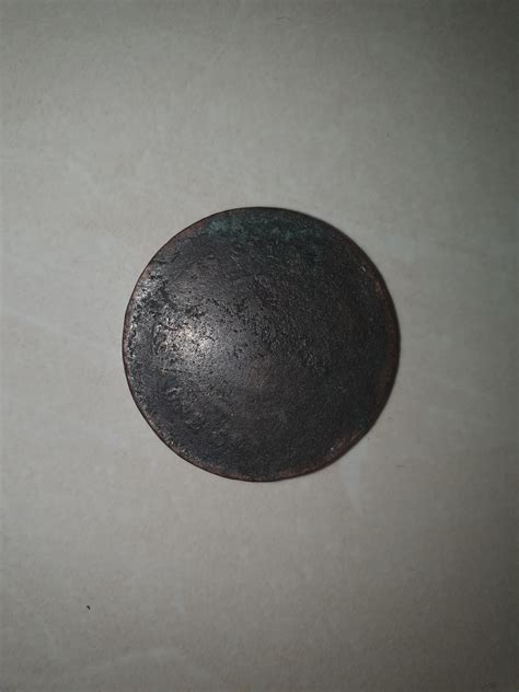 I Found This Coin Recently But Its Rusty And Cant Identify The Word
