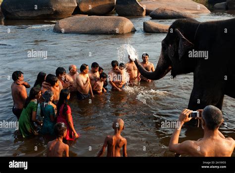 Indian People Bathing Tungabhadra River Hi Res Stock Photography And