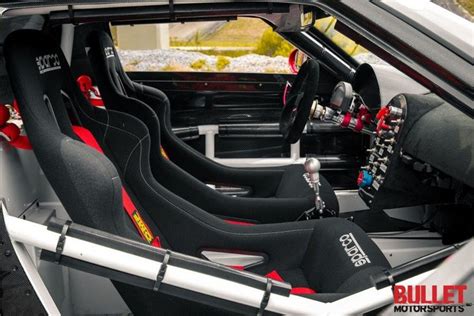 Interior Of Rossion Q1r Race Car With Black And Red Seats