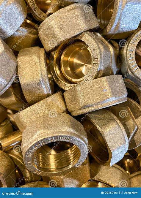 Brass Plumbing Fitments In A Heap Ready To Be Reused Stock Image