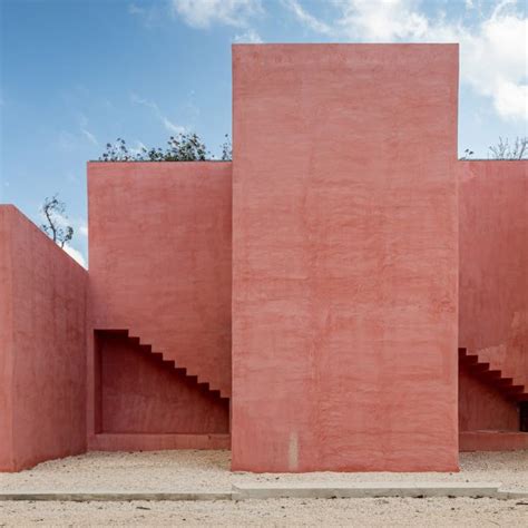 Coyote Arquitectura Designs Repetitive Red Housing In Tulum