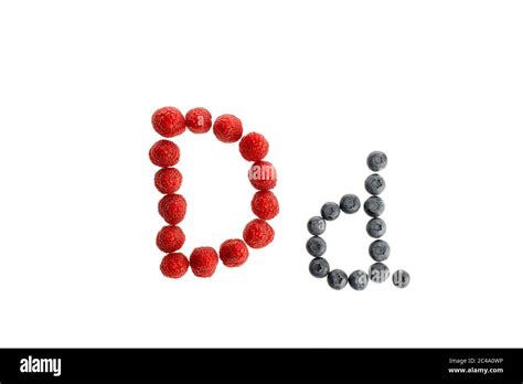 Alphabet From Fresh Fruit Raspberry And Blackberry Isolated On A