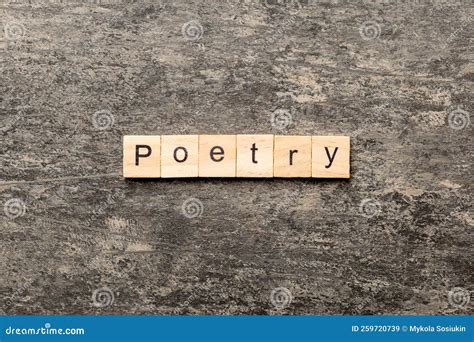 Poetry Word Written On Wood Block Poetry Text On Cement Table For Your Desing Top View Concept