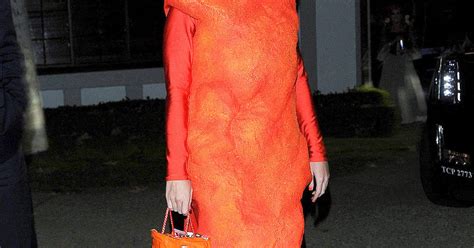 Katy Perry Wears A Flamin Hot Cheeto Costume For Halloween Photos