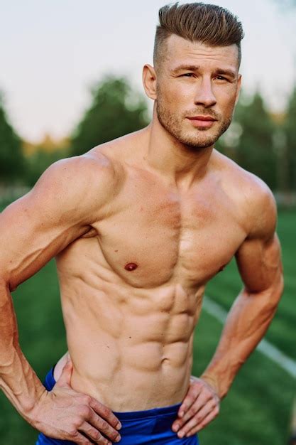 Premium Photo Portrait Of Shirtless Man Standing Outdoors