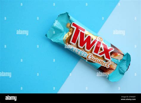 Ternopil Ukraine July 7 2023 Twix Salted Caramel Blue Wrapper On Wooden Background Twix Is