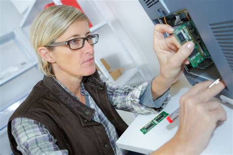 Girl With Tester And Printed Circuit Board Stock Image Image Of People Multimeter