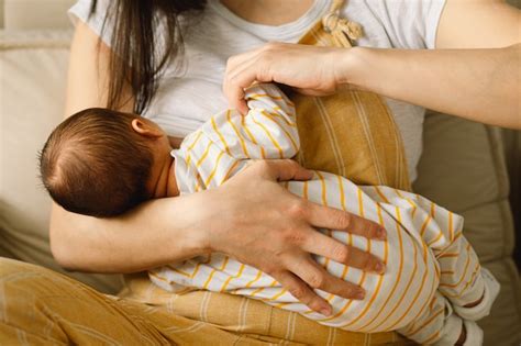 Premium Photo Newborn Baby Boy Sucking Milk From Mother S Breast