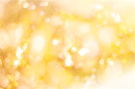 매력적인 화이트 실버 및 골드 추상화 Bokeh 빛 반짝 스파클 Defocused 배경 럭셔리 골든 컬러 파티 생일 기념일