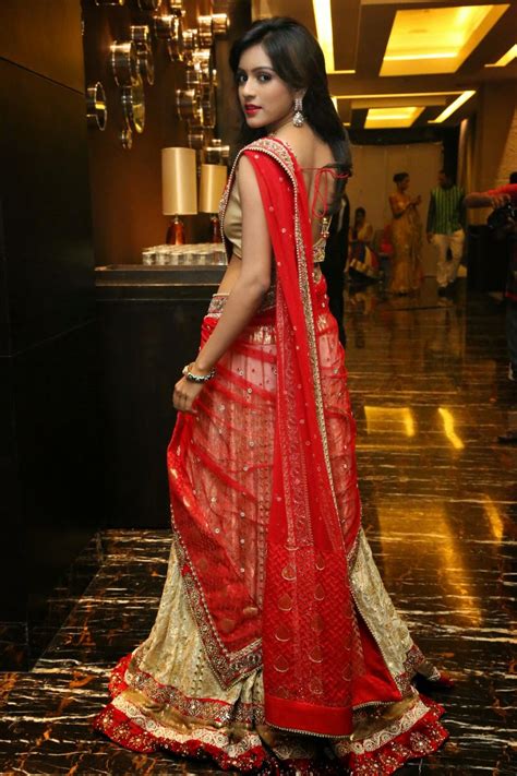 Cap Vithika Sheru In Spicy Half Saree Photos