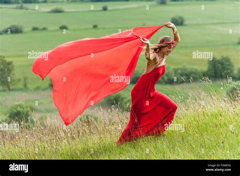 Woman In Red Dress Running