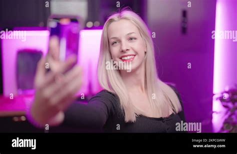 Cute Blonde Influencer Girl In Kitchen Pose For Tiktok Loopable Video Selfie 4k Stock Video