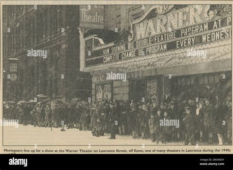 Moviegoers Line Up For A Show At The Warner Theater On Lawrence Street