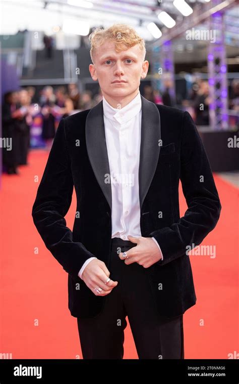 George Jaques Poses For Photographers Upon Arrival For The Premiere Of The Film Saltburn On
