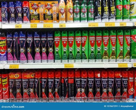 Selective Focused Of Insecticides In Cans Are Displayed On Shelves For