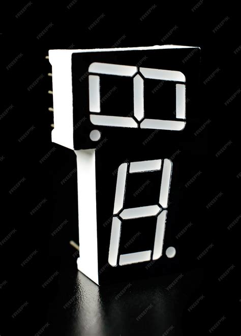 Premium Photo Seven Segment Indicators On A Black Background
