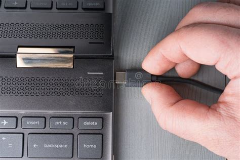 USB Type C Grey Cable Being Connected To The Laptop Stock Photo Image Of Plug Accessory
