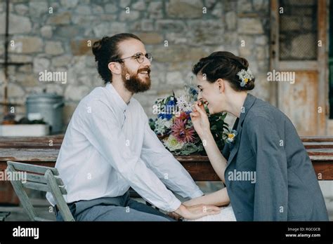 Bride And Groom Sitting Hi Res Stock Photography And Images Alamy