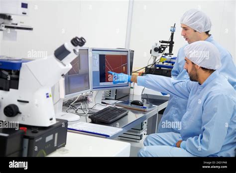 Watching Polymeric Nano Fibers Atomic Force Microscope Afm In The Foreground The Axio Observer