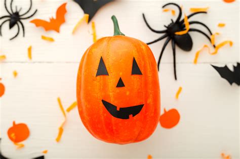 Halloween Background With Jackolanter Paper Bats Spiders Confetti On