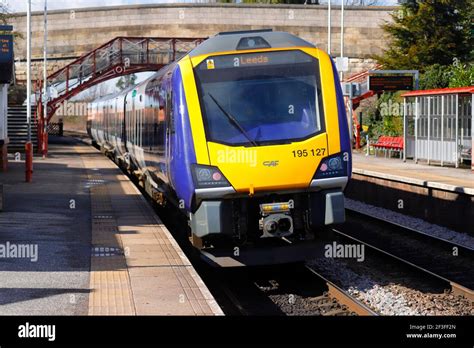 Rail Class 195 Train By Northern Rail Running Through Garforth Station