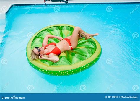 Girl Lying On Inflatable In Swimming Pool Stock Image Image Of Floats