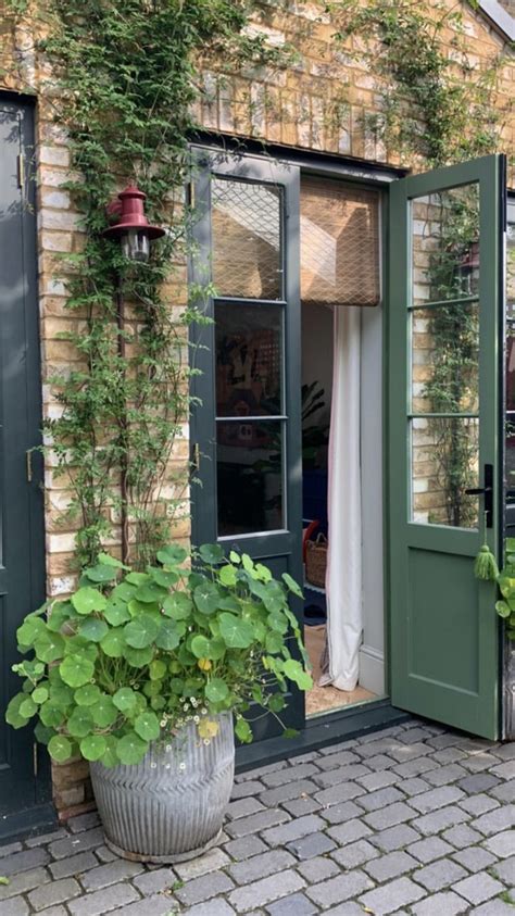 Small Courtyard Garden With Green Shutters