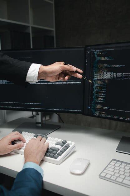 Premium Photo Group Of Programmers Brainstorm Together To Write