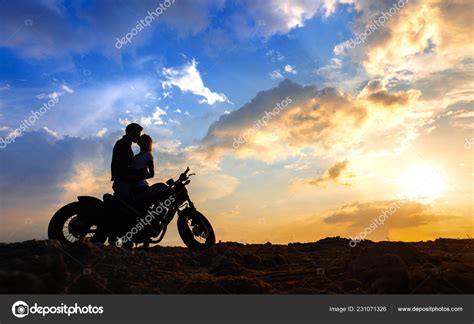 Motorcycle Couple Sunset