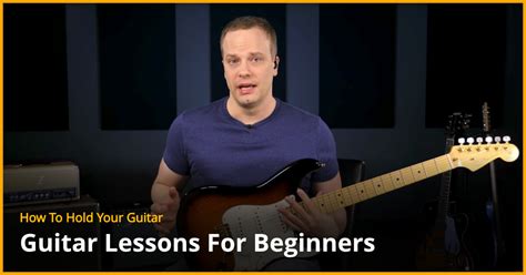 How To Hold The Guitar Free Guitar Lesson