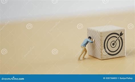 Person Pushing Large Up To Target Symbol On Wood Icon For Set Up