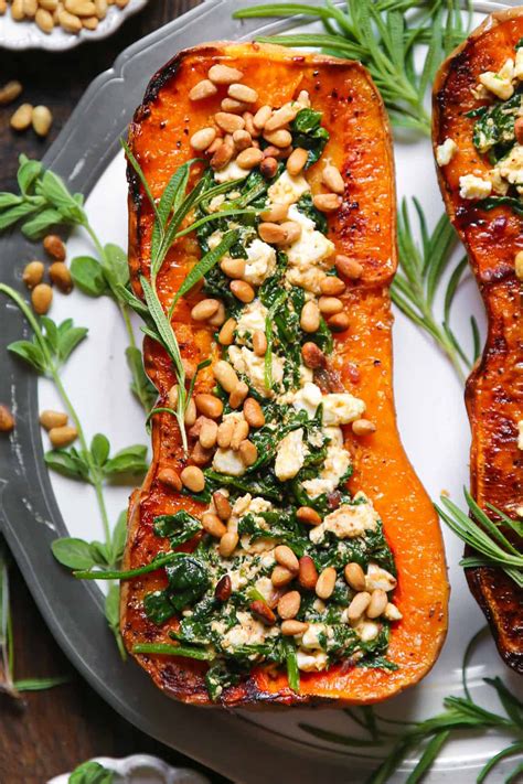 Sausage Stuffed Butternut Squash With Spinach Pecans And Cranberries