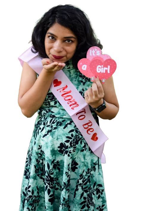A Pregnant Indian Lady Poses For Outdoor Pregnancy Shoot And Hands On