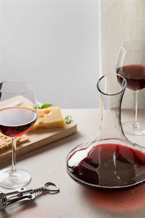 Premium Photo Wine Glass And Carafe Arrangement
